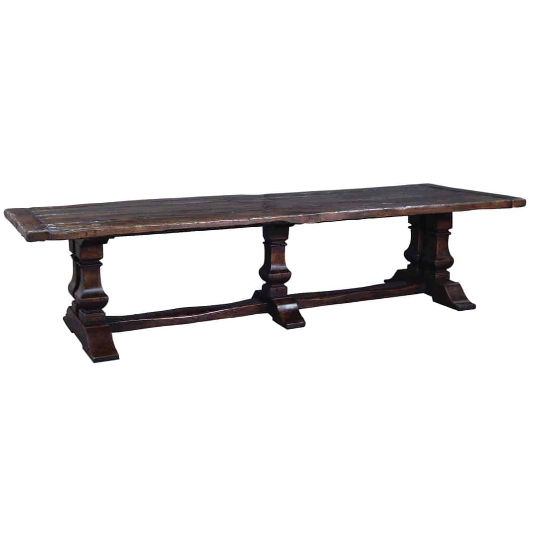 Rustic oak long dining table with chamfered legs