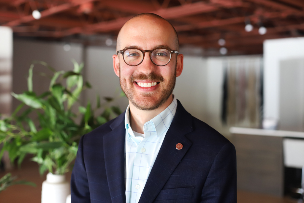 John Economos — Bâton Global