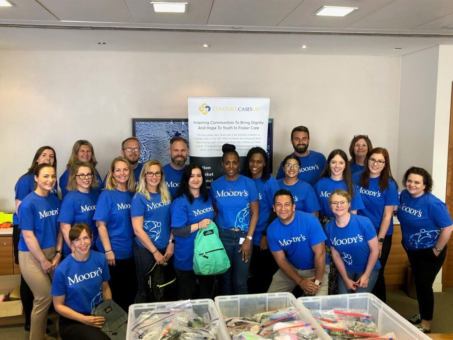 Moody's Community Impact | Coming together to make a difference: Moody ...