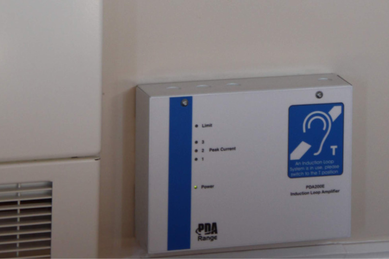 How often should Induction Loop System Maintenance be carried out?