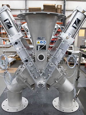 Gravity Vee Diverter Handling Oat Kernels | Vortex