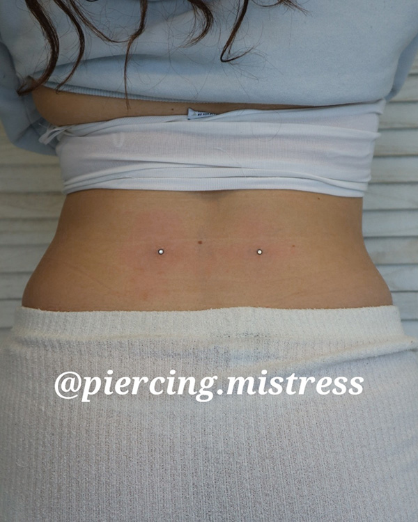 Lower Back Dimples Piercing