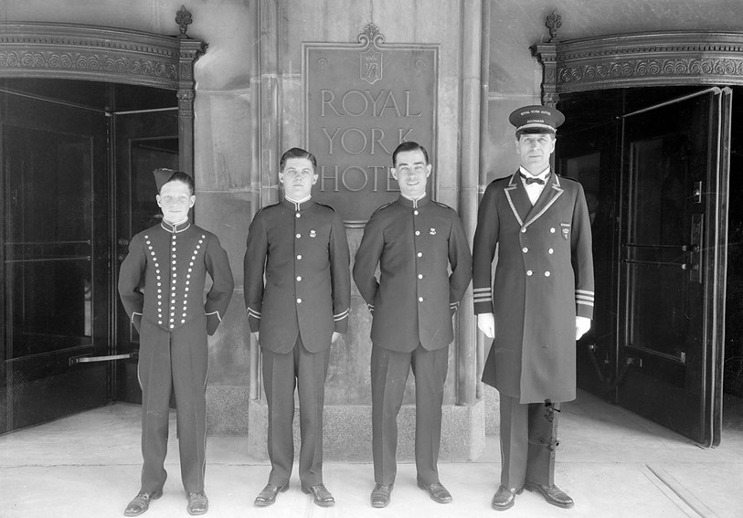 The Evolution of Elegance: A Journey Through the History of the Doorman Coat | Studio 104