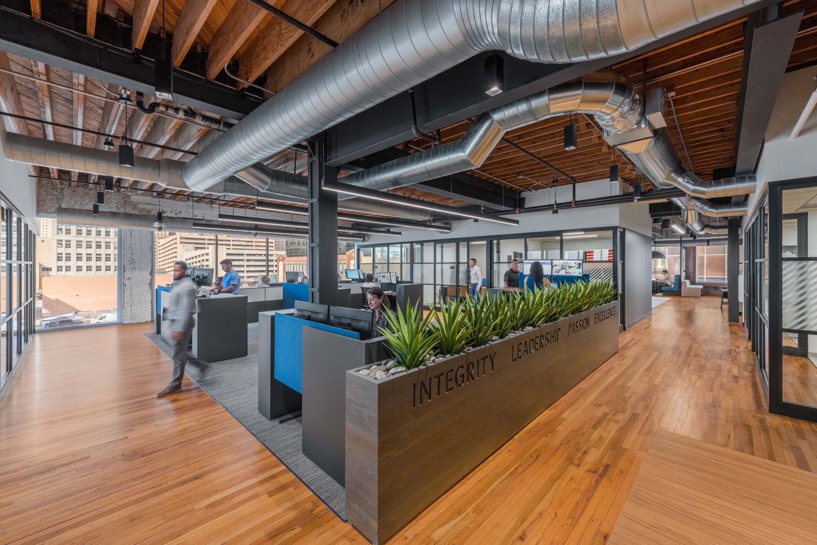 Transform your workspace with Tangram Interiors.