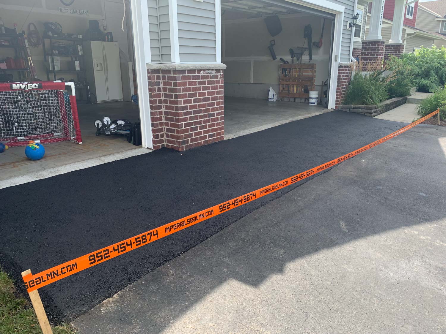 Driveway Apron Asphalt Garage by Imperial Seal Asphalt & Sealcoating