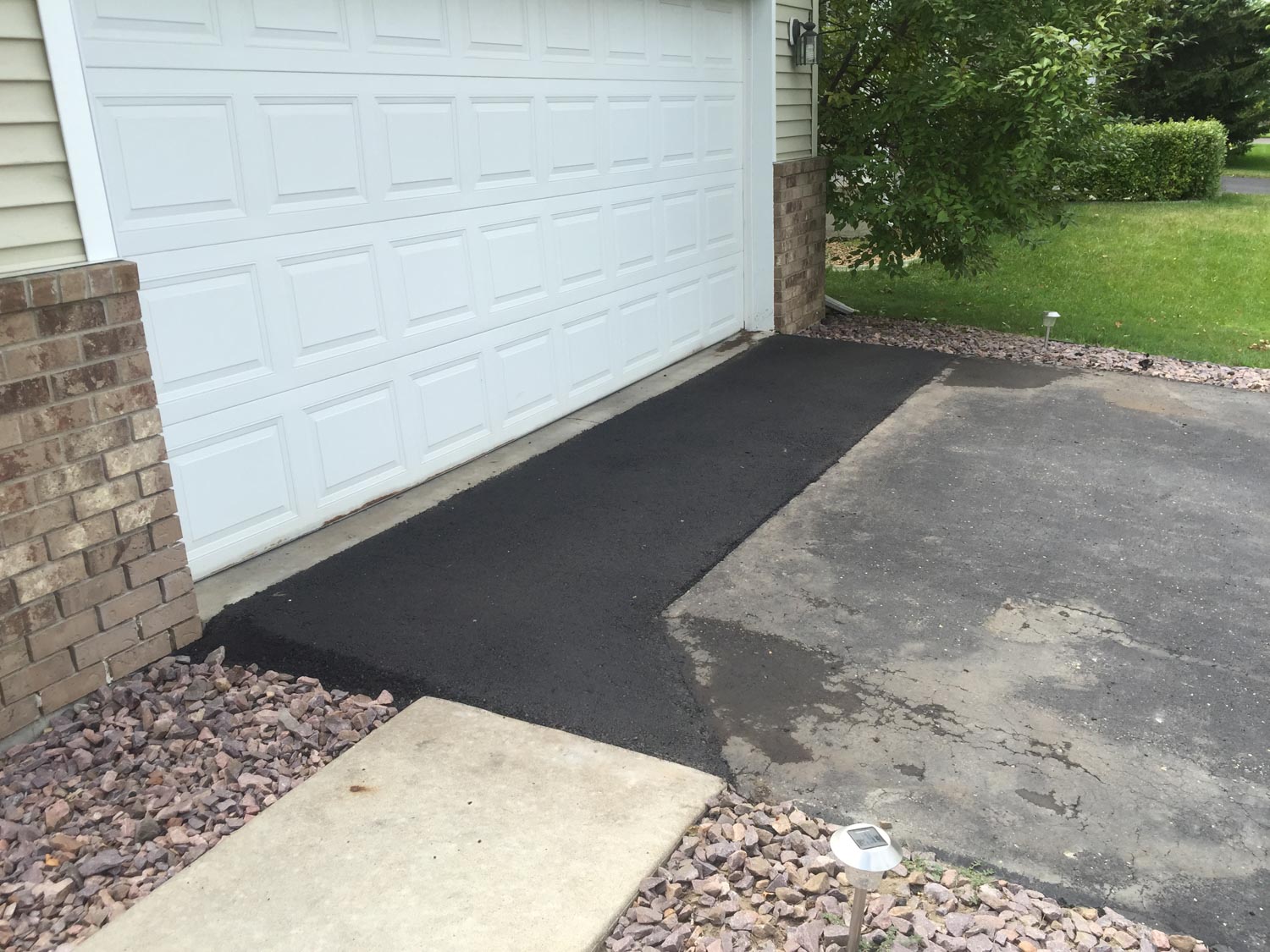 Driveway Apron with a Tail MN by Imperial Seal Asphalt & Sealcoating