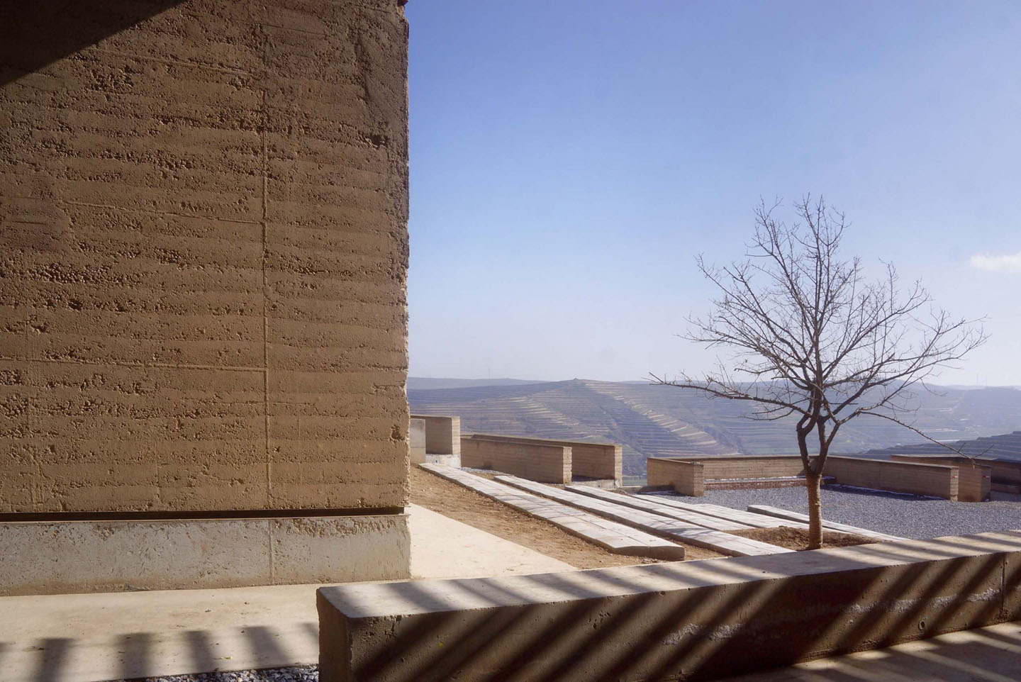 Macha Village Center by ONEARTH Architecture