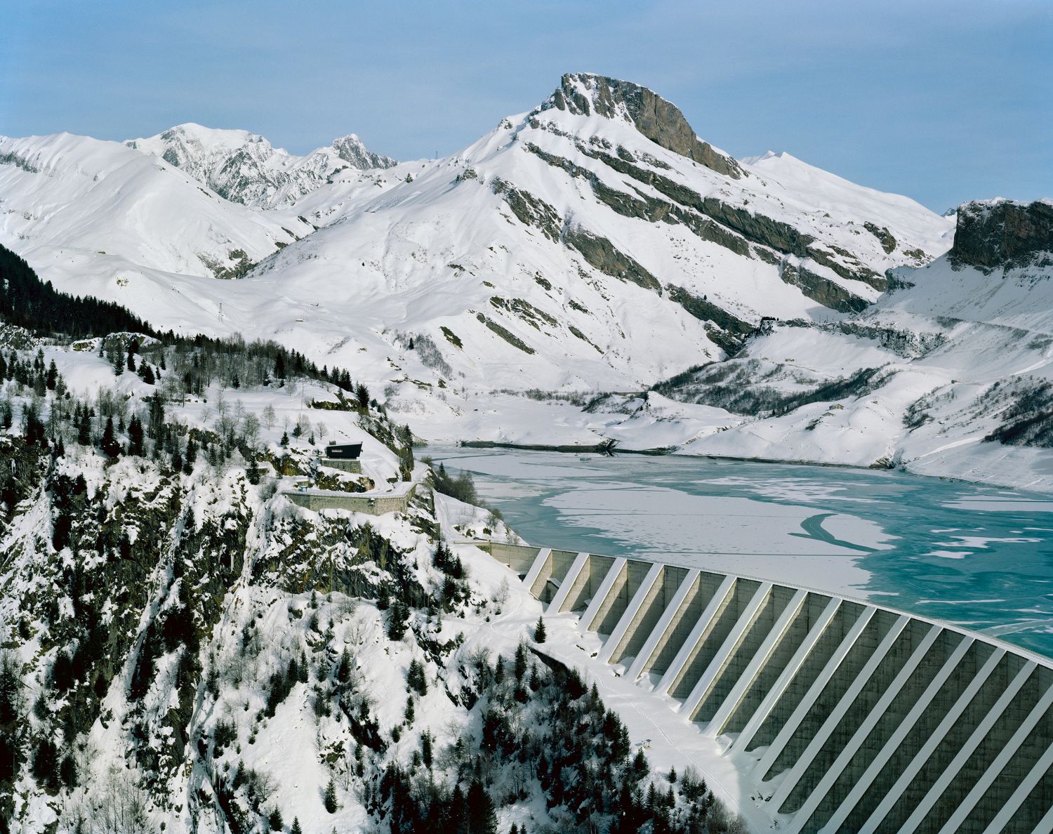 Dam and Man in Savoy by Céline Clanet