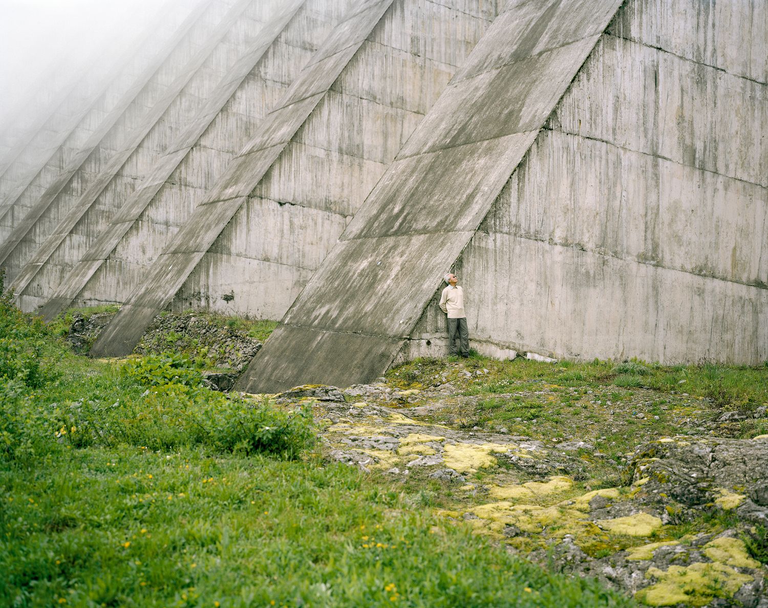 Dam and Man in Savoy by Céline Clanet