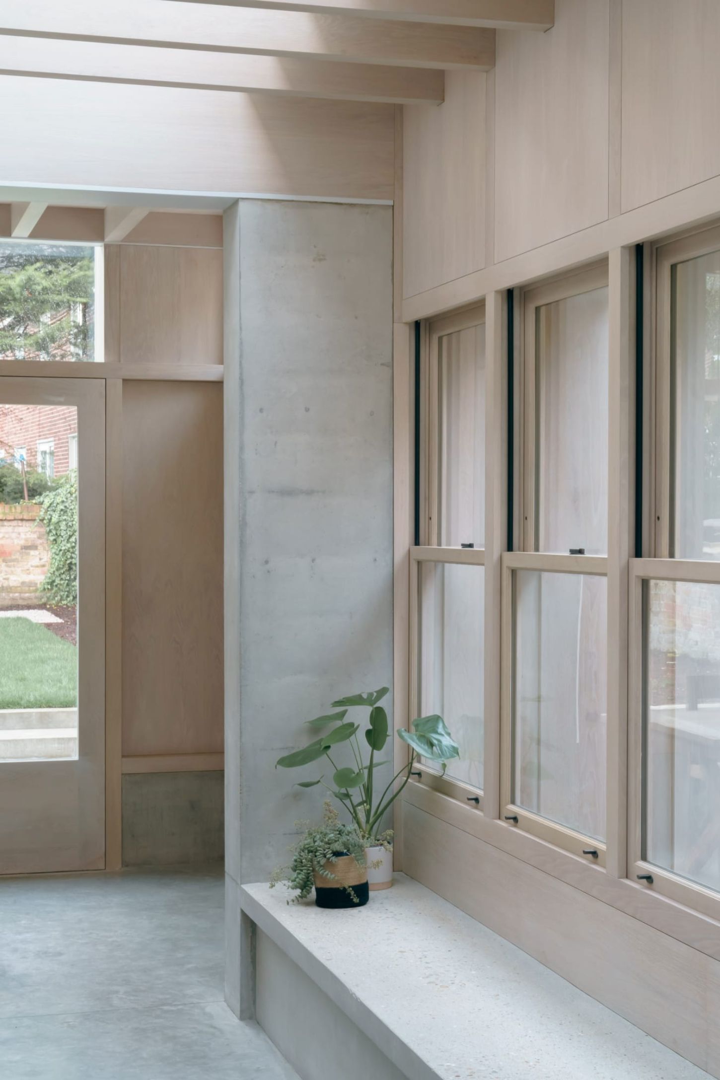 Concrete Plinth House by DGN Studio