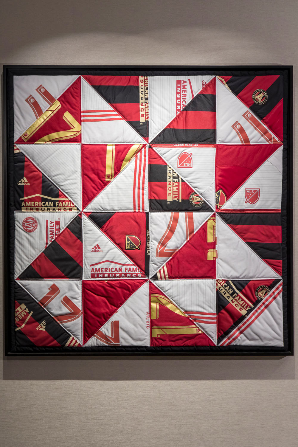 Home Away – by Hank Willis Thomas | Art Collection at Mercedes-Benz Stadium