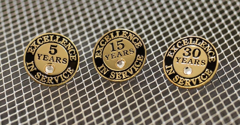 5 Reasons Your Business Needs Custom Corporate Lapel Pins | PinProsPlus
