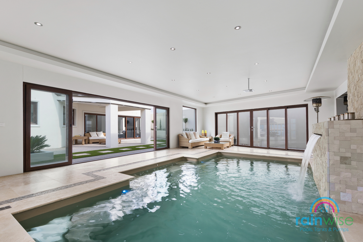 Indoor Pool with Spa Jets and Custom Water Feature Greenvale | Rainwise ...