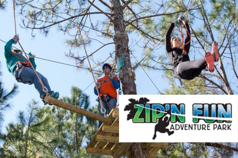 Teenagers doing Zip line - Zip'N Fun Adventure Park