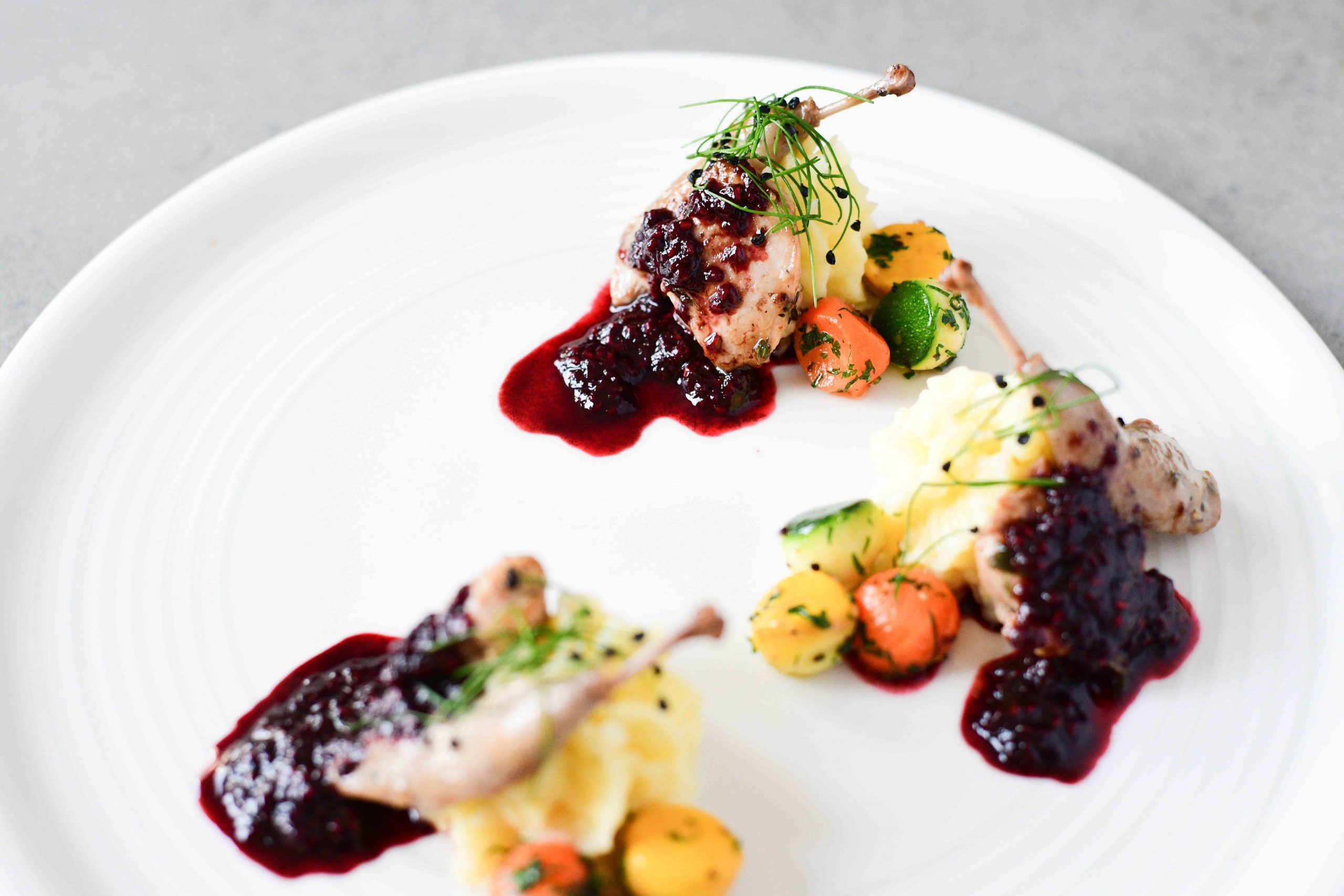 Pan-fried Quail with Berry Compote, Mashed Potato and Pearl Vegetables