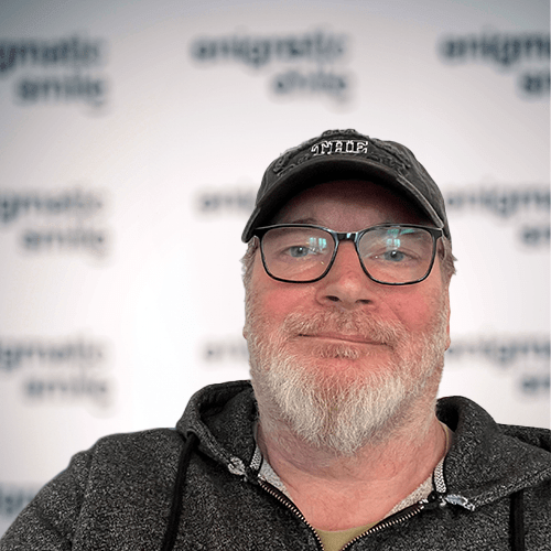 About - Enigmatic Smile