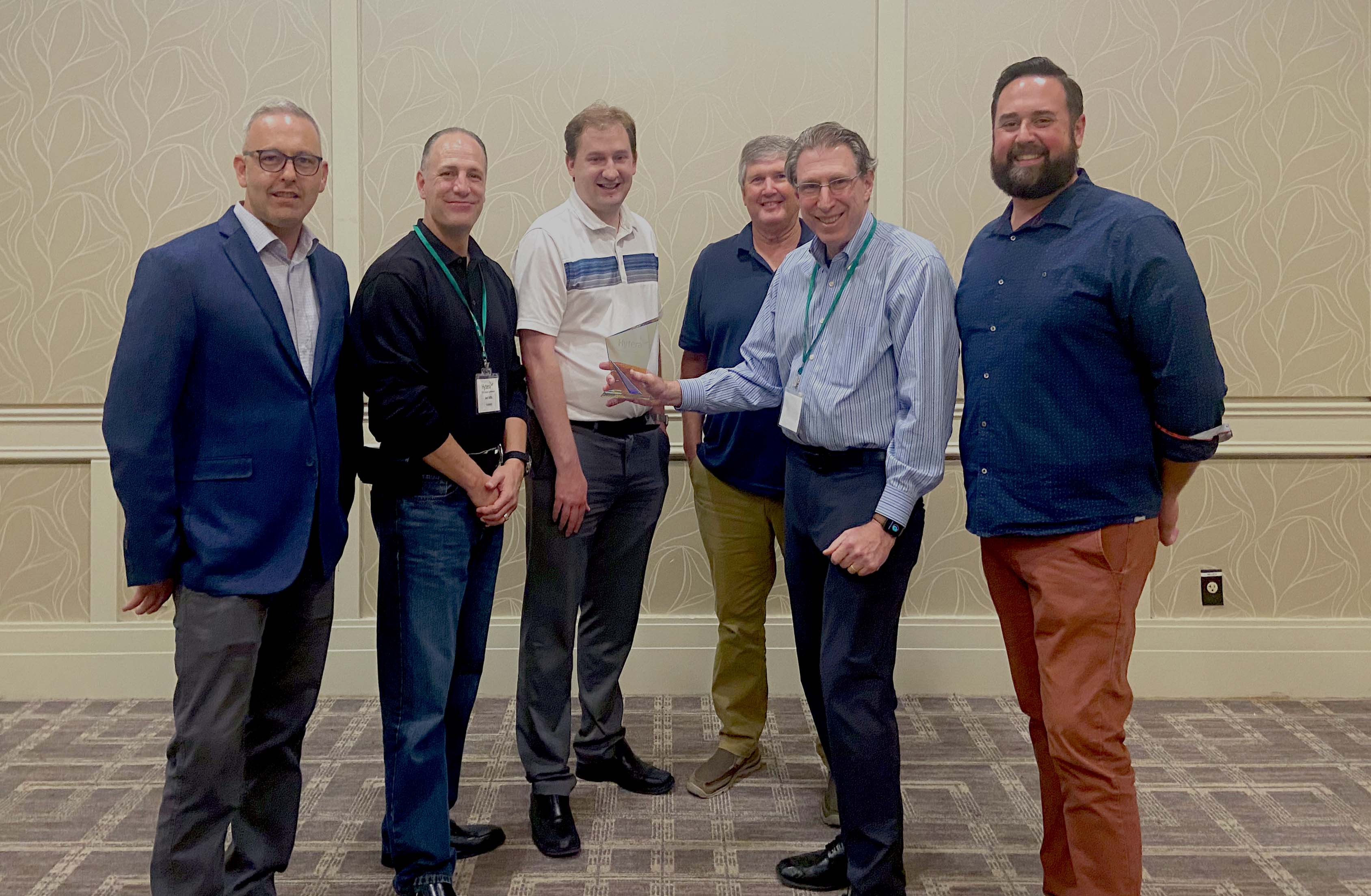 Warner Communications/Voceon Receive Platinum Dealer Award From Hytera