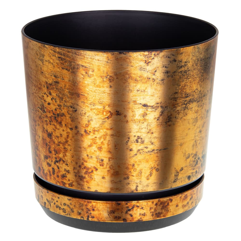 Roulnd rust effect plant pot with drainage holes and saucer.