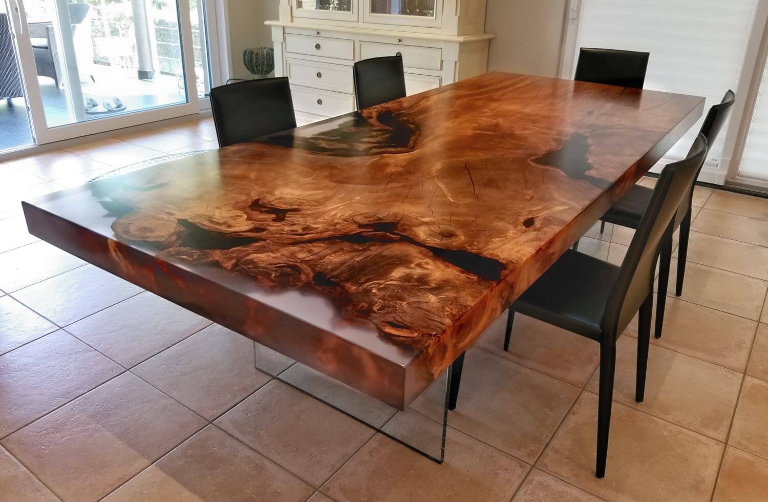 Fine wooden tables made from 1000-year-old kauri as an investment