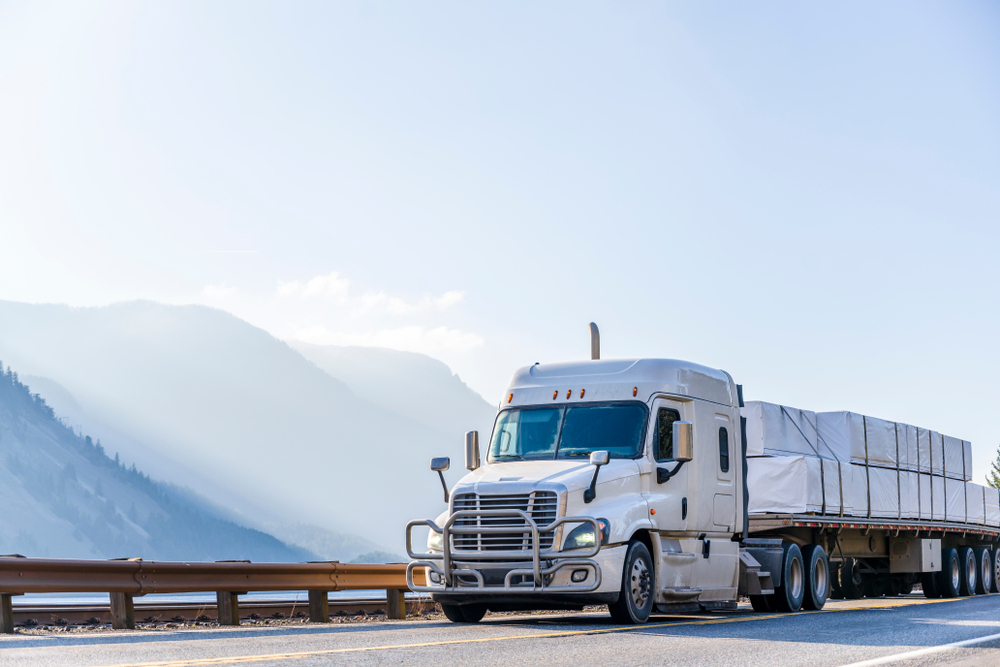 Flatbed trucking: How it works, rates, pros & cons | Rose Rocket