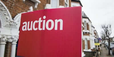 Why Do Houses Go To Auction? [2 Main Reasons] | HomeSellingExpert