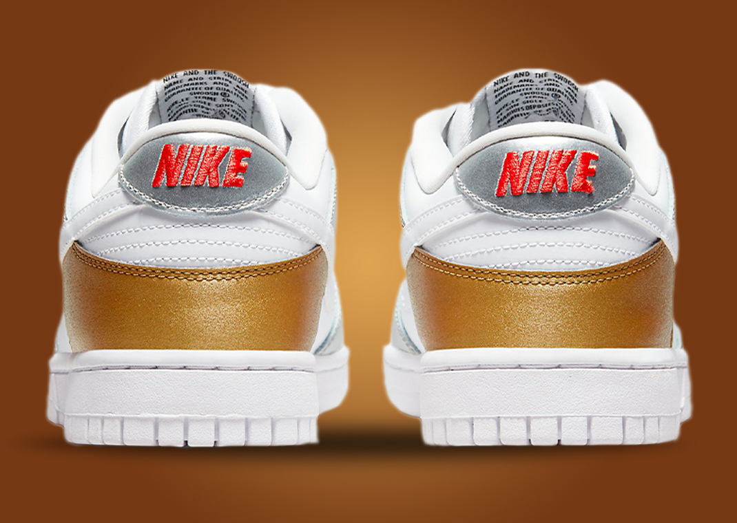 Silver And Gold Comes To The Women's Nike Dunk Low - Sneaker News