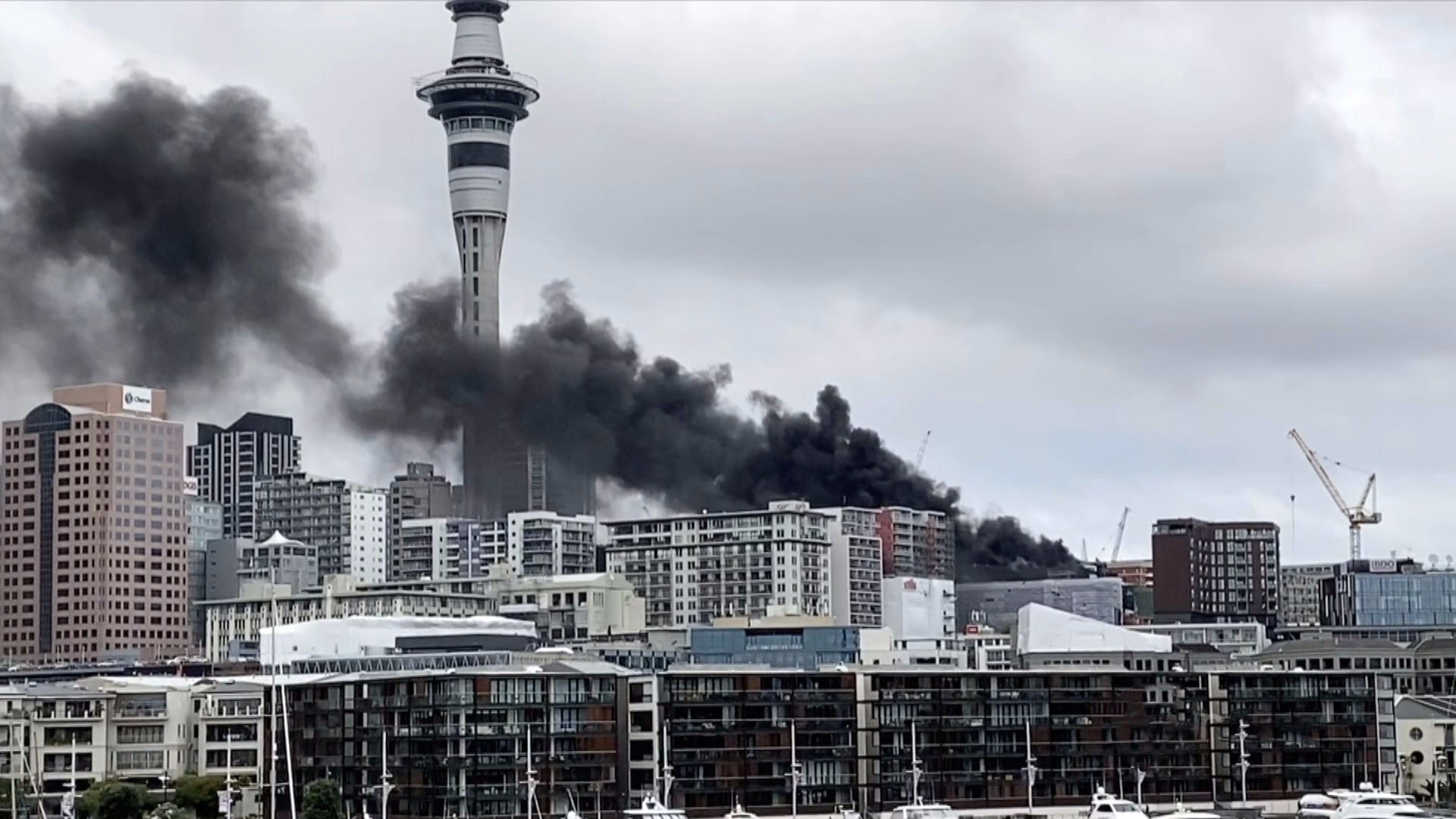 Helicopter footage captures firefighters battling blaze on roof of ...
