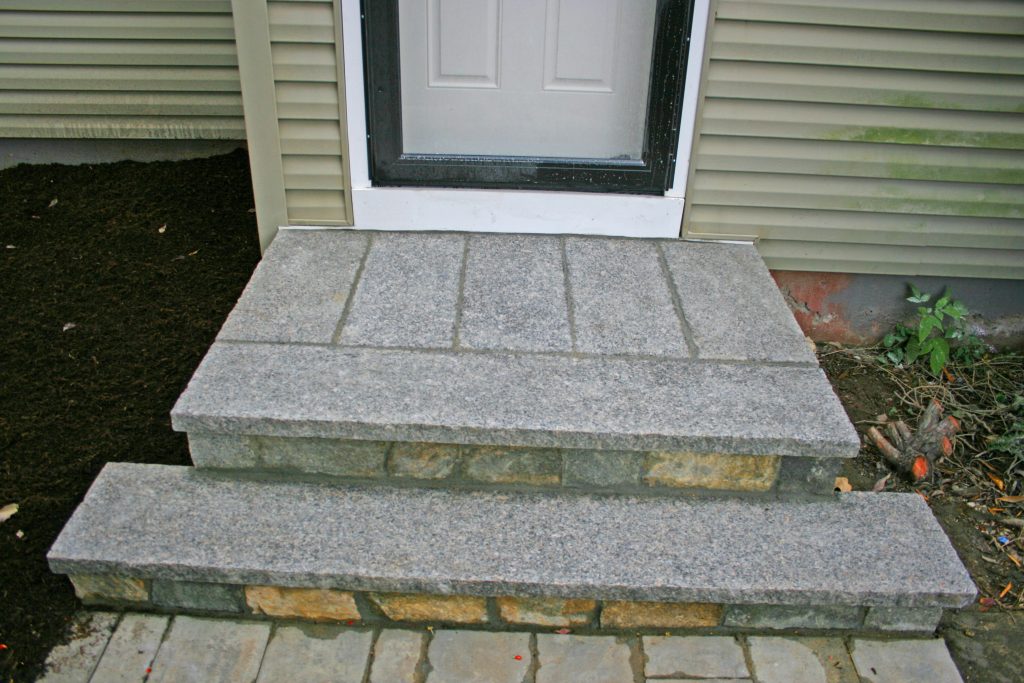 Natural Stone Front Steps with Granite Treads | Artistic Landscapes