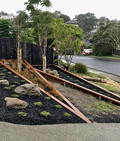 Transformed steep driveway into a cool angular garden | Project