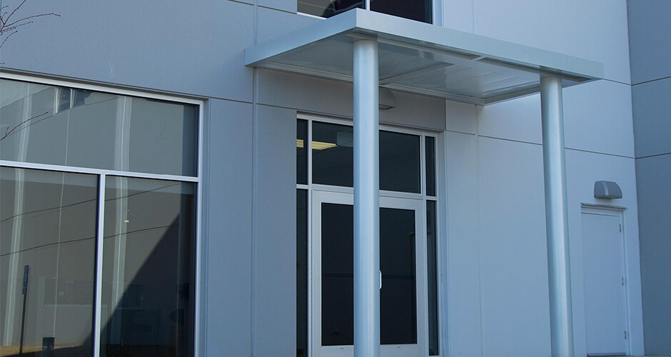 Arched Canopies | Custom Hanger-Supported Arched Aluminum Canopies