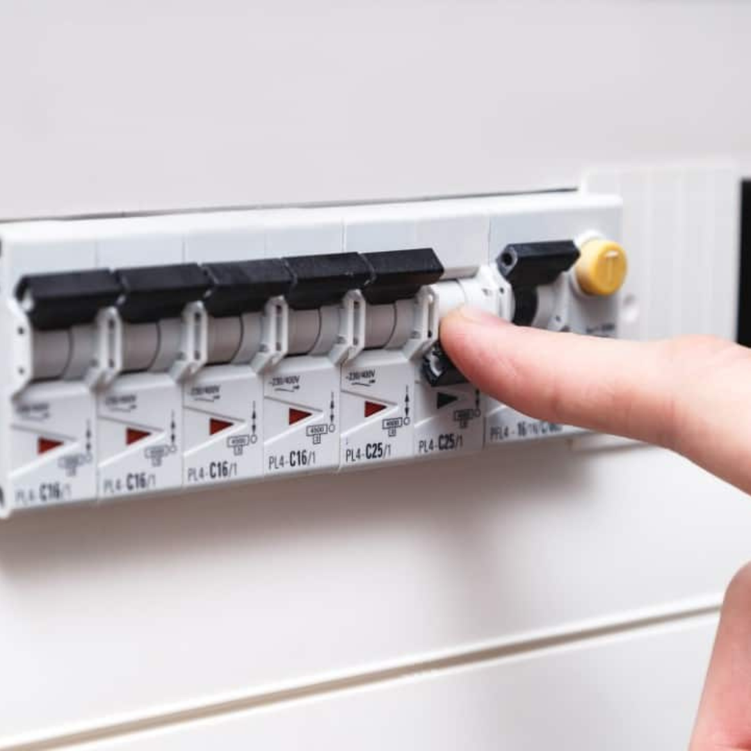 How do we shut off power in an electrical emergency?