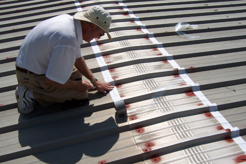 Patching Screw Holes In Metal Roof | Sky High Roofing QLD