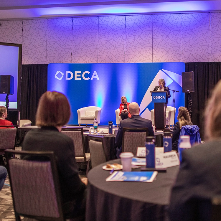 Our Impact | DECA Inc.