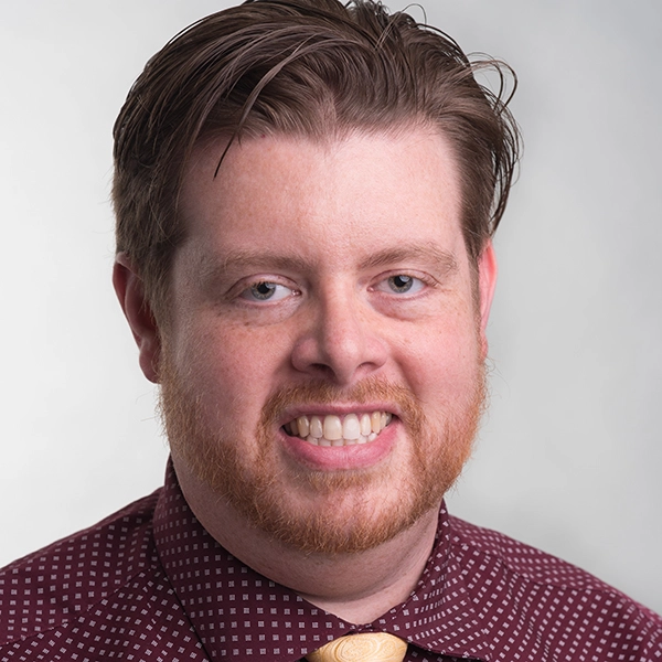 Adam Feazell | DECA Inc. Staff