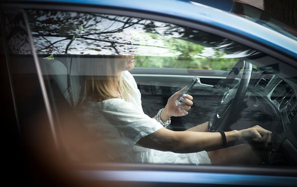 UK Drivers Face £200 Fine For Using Phone While Driving | The Shade Borough