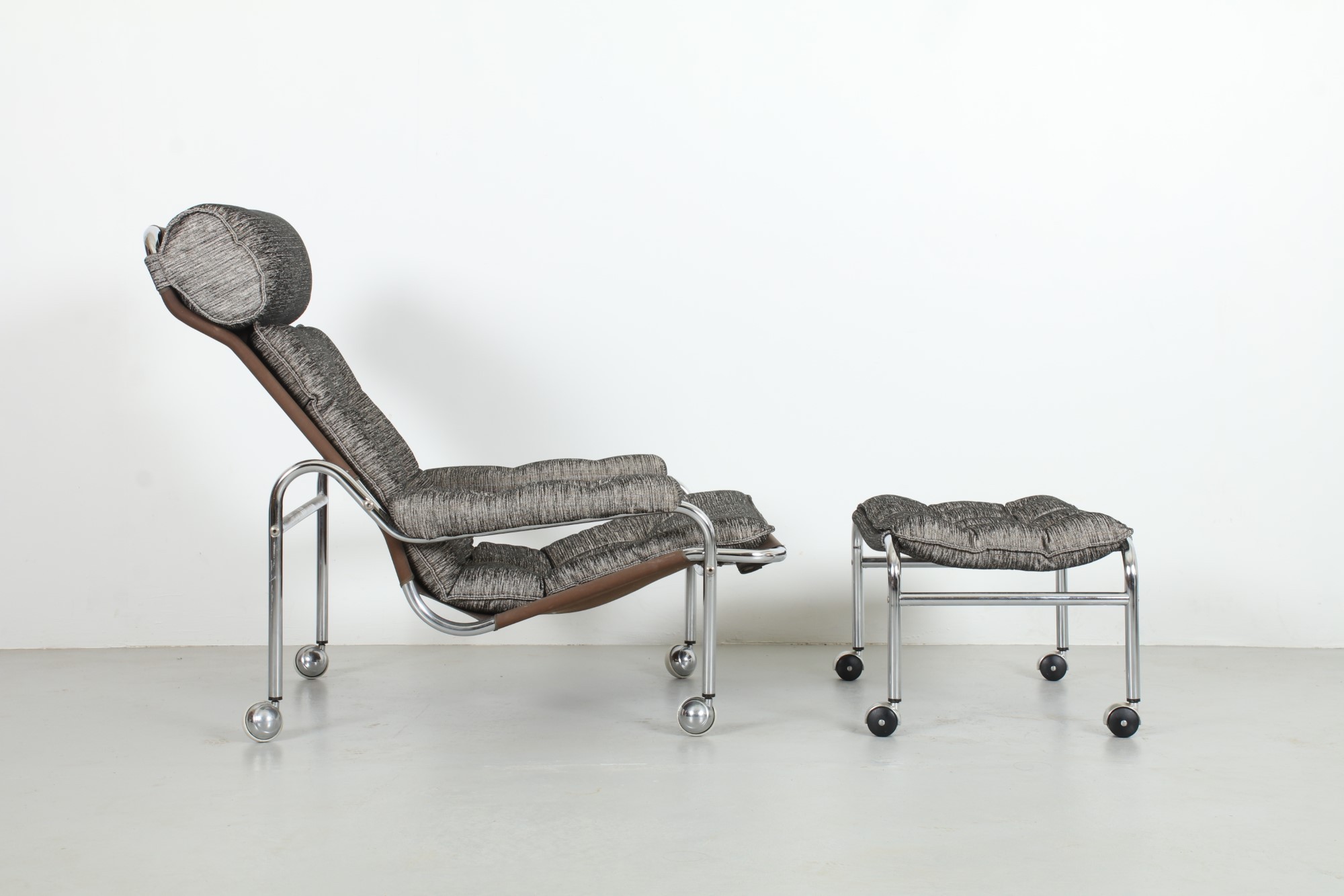 Sleek Dux 'Karin' Armchair and Ottoman by Bruno Mathsson