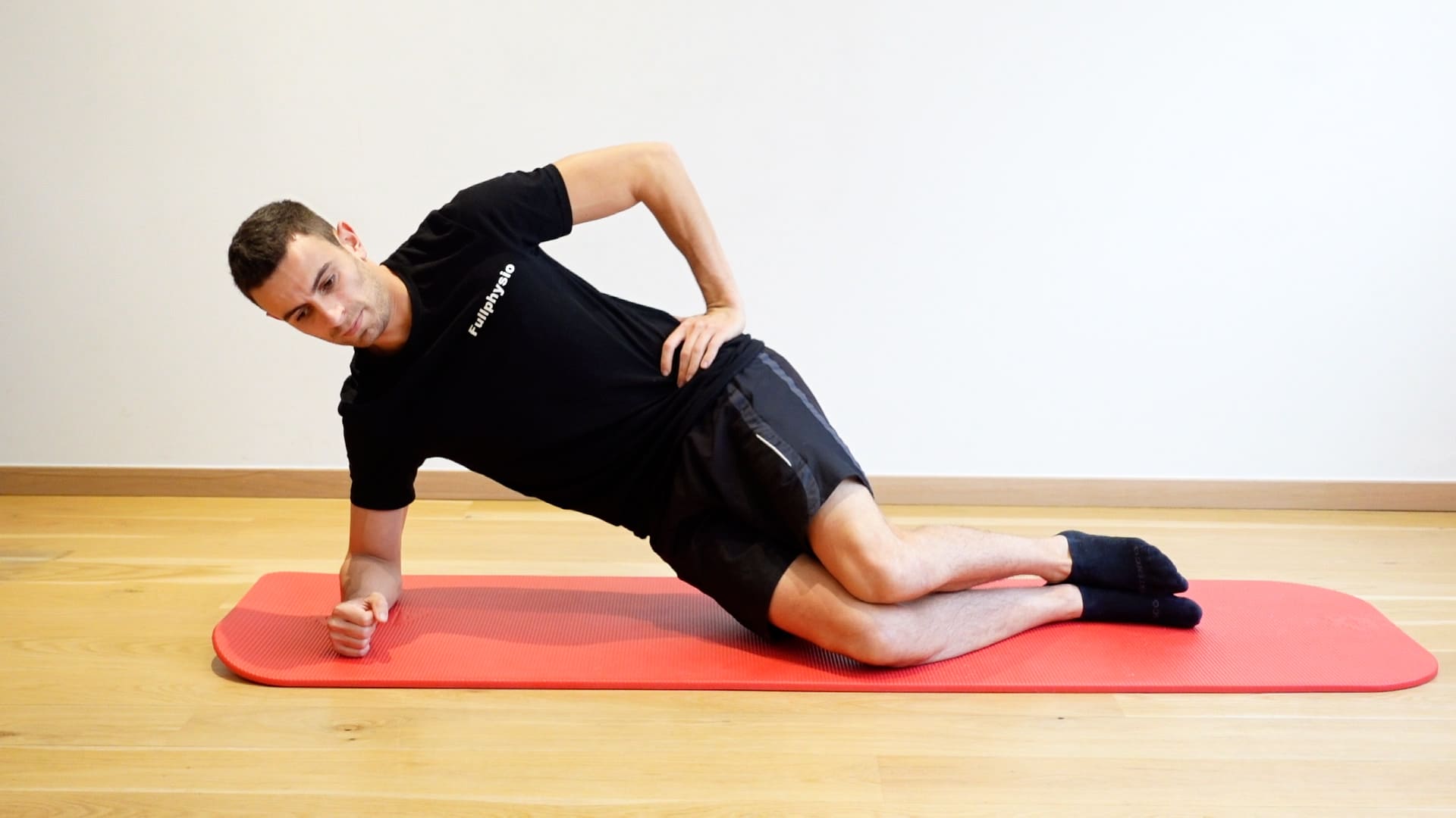 Vidéo d'exercice - Gainage latéral hanches et genoux fléchis