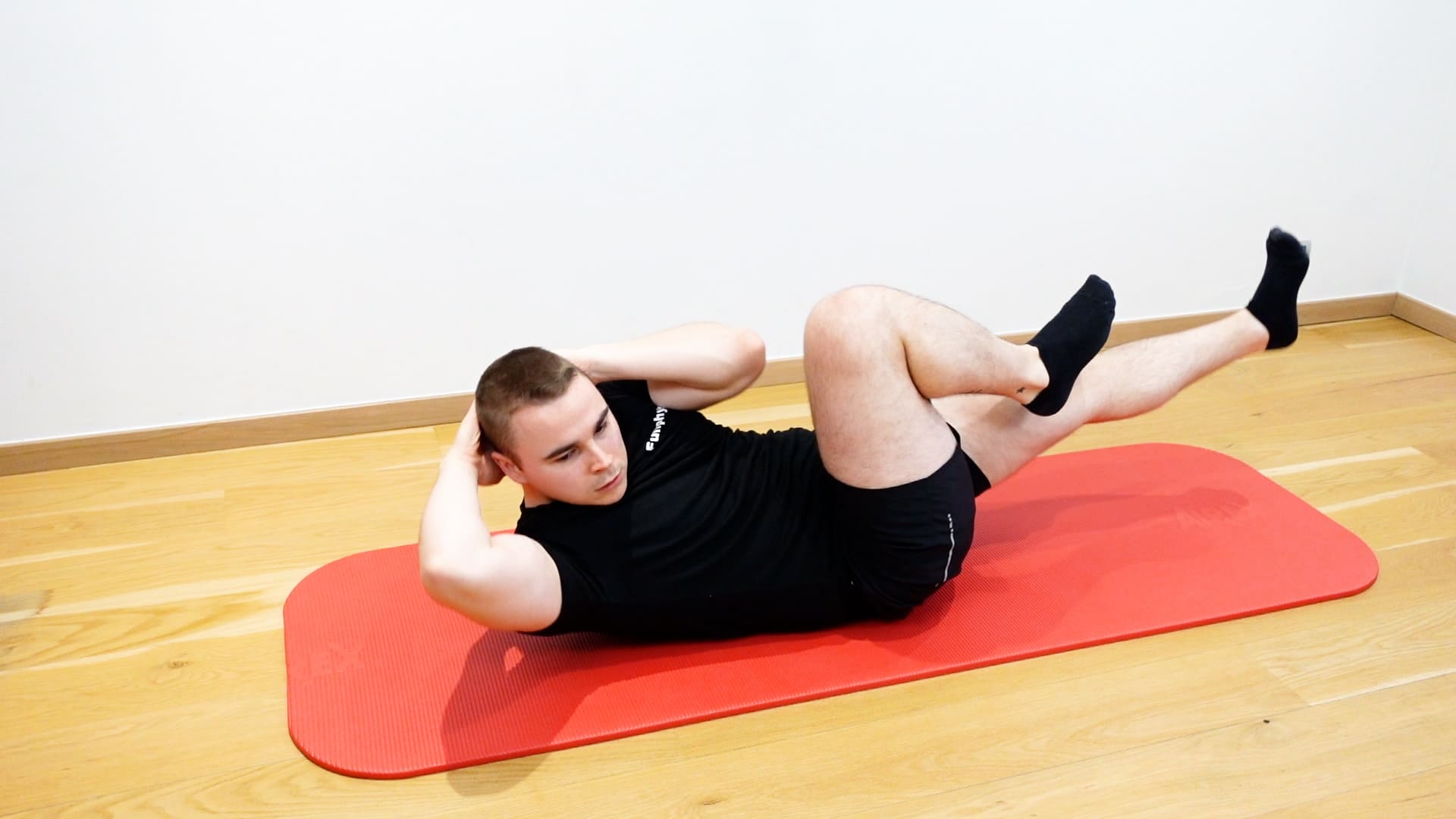 Vidéo d'exercice - Renforcement abdos coude-genou croisés