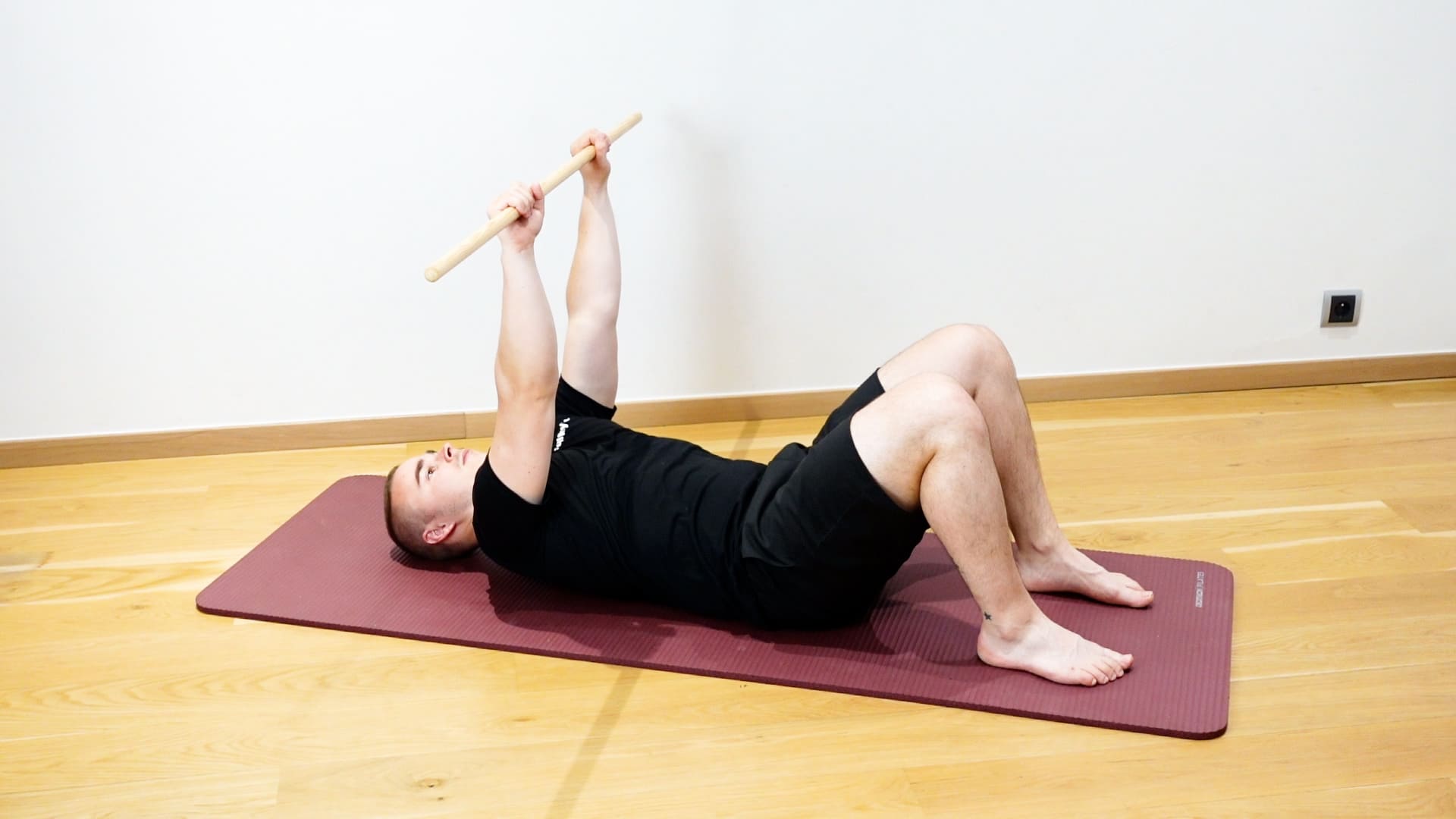 Vidéo d'exercice - Protraction scapulaire avec bâton