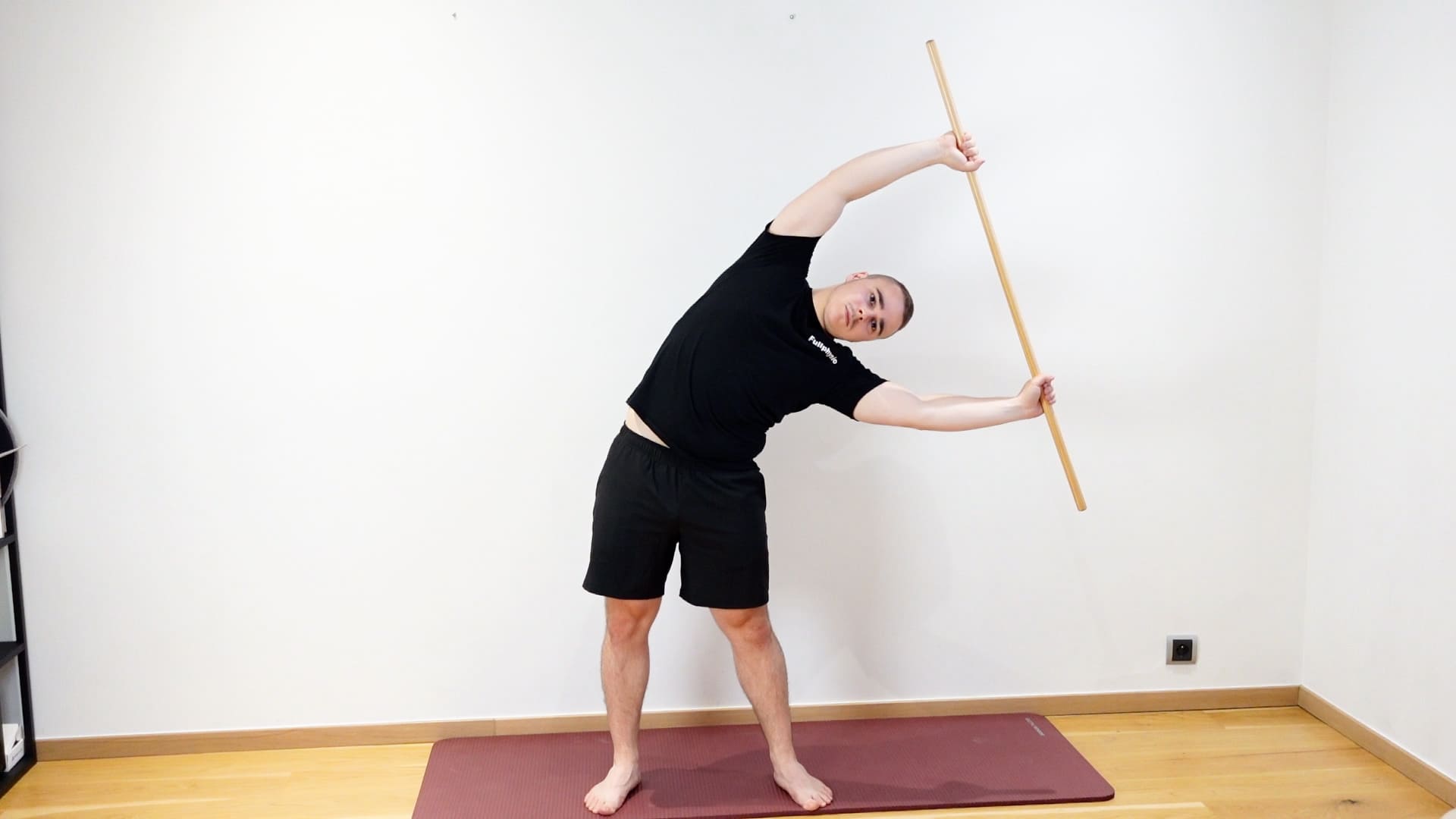 Vidéo d'exercice - Inclinaison du tronc avec bâton