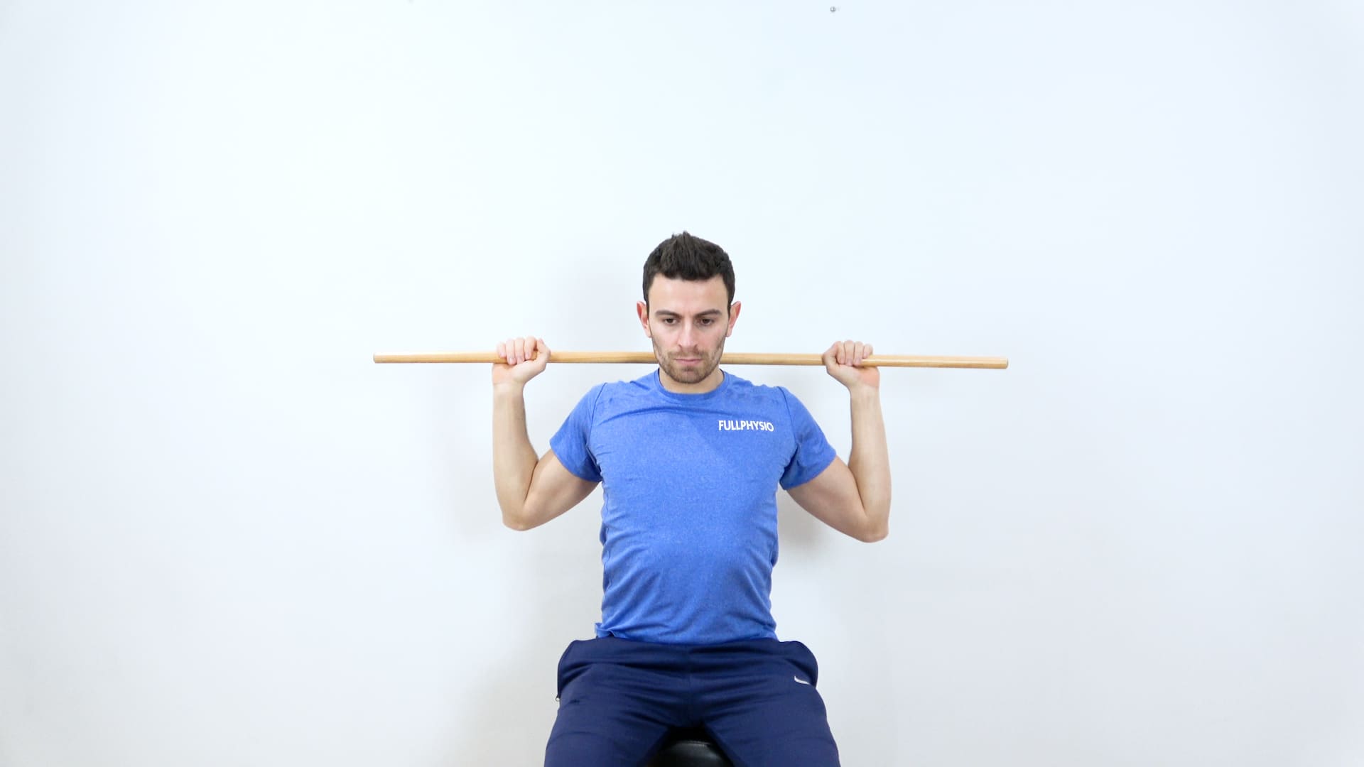 Vidéo d'exercice - Mobilité épaule assistée avec bâton derrière la tête