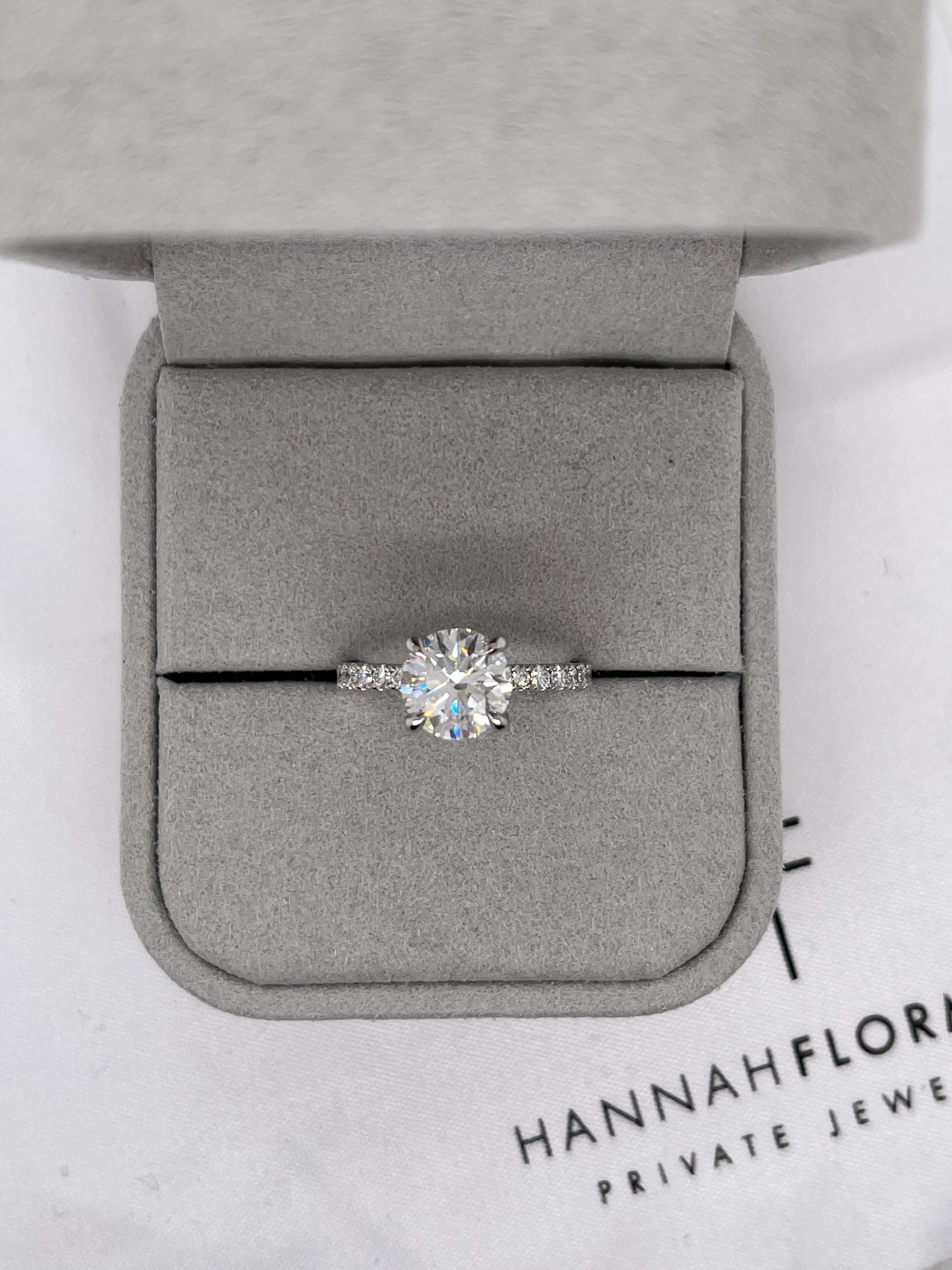 Three Stone Emerald Cut Diamond Bezel Engagement Ring | Hannah Florman