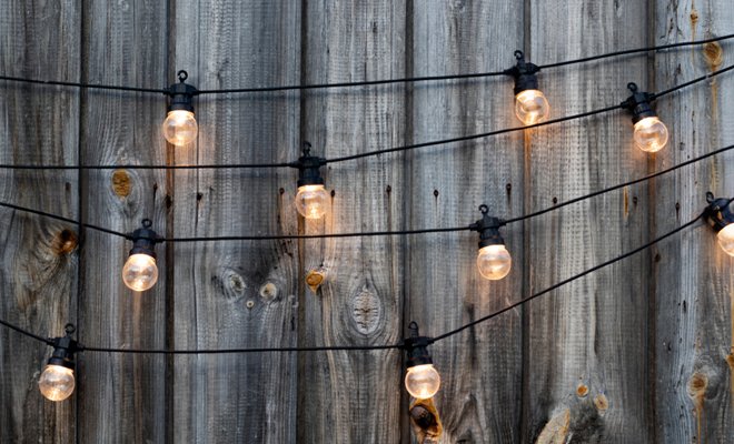 Six Unique Backyard Fence Light Ideas