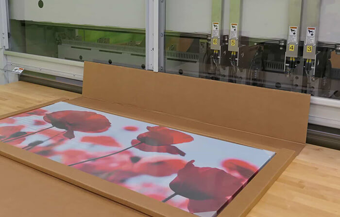 Die perfekte Verpackung für Printmedien | Packsize