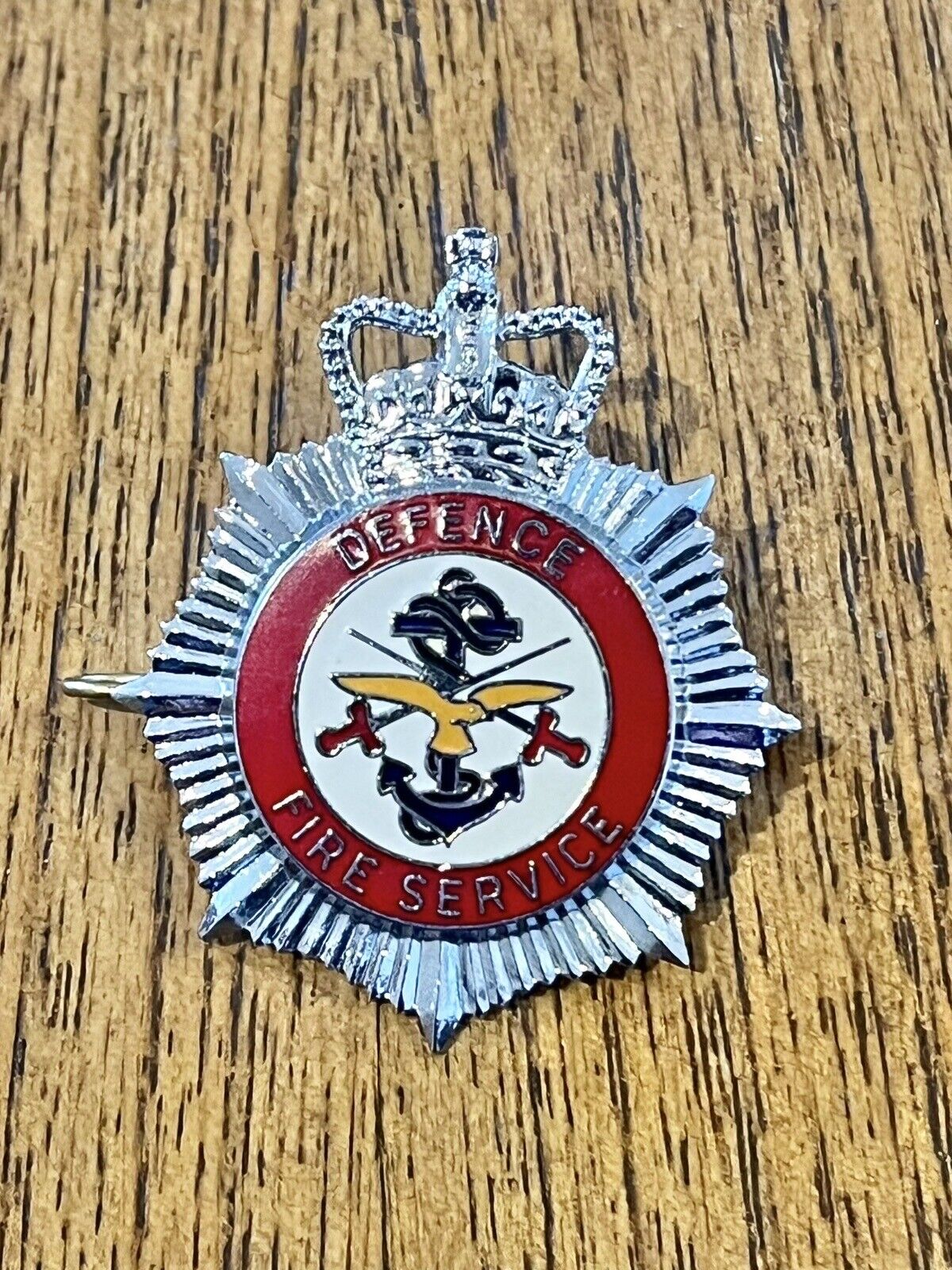 Rare British Army Defence fire service cap badge.
