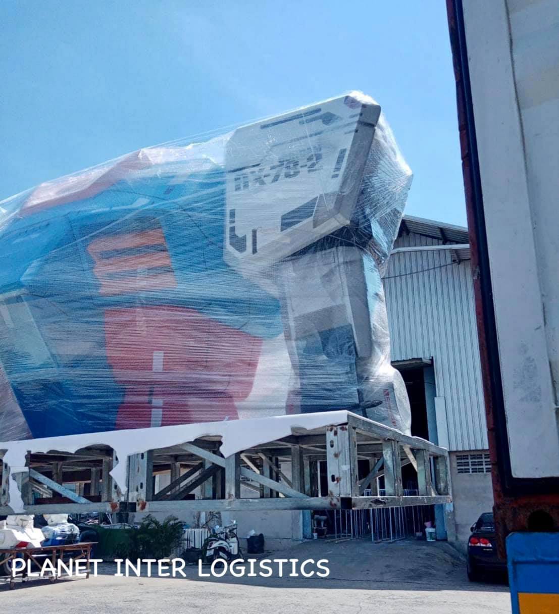 Gundam Adventure: Planet Inter Logistics Delivers the Giant Mannequin Head with Precision