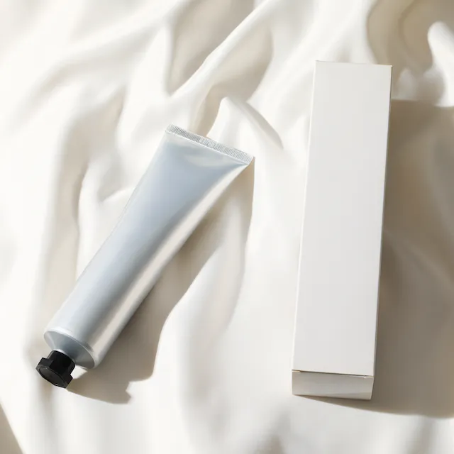 Grey Cream Tube and Product Box Mockup