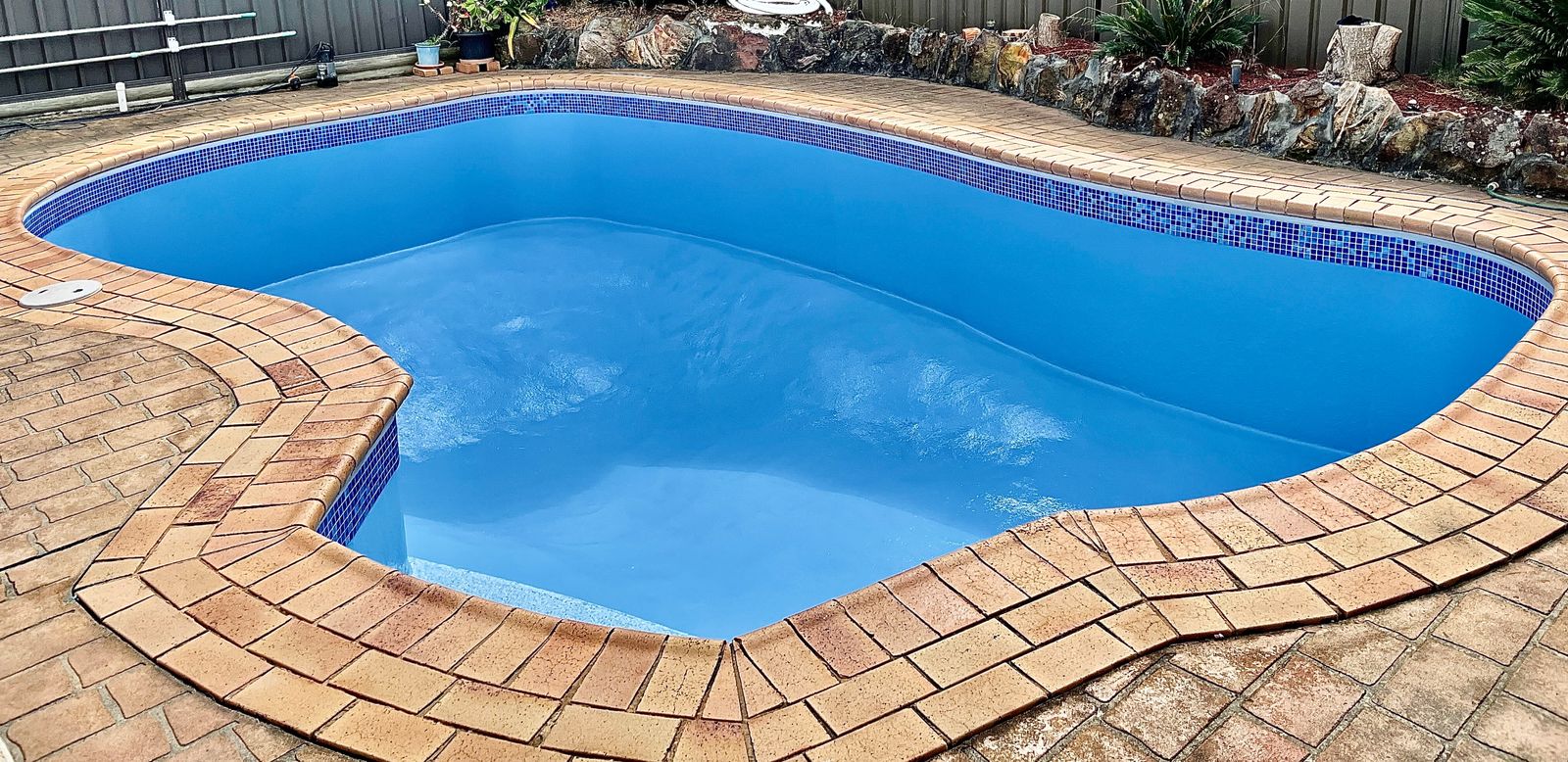 Converting vinyl liner to fiberglass interior pool