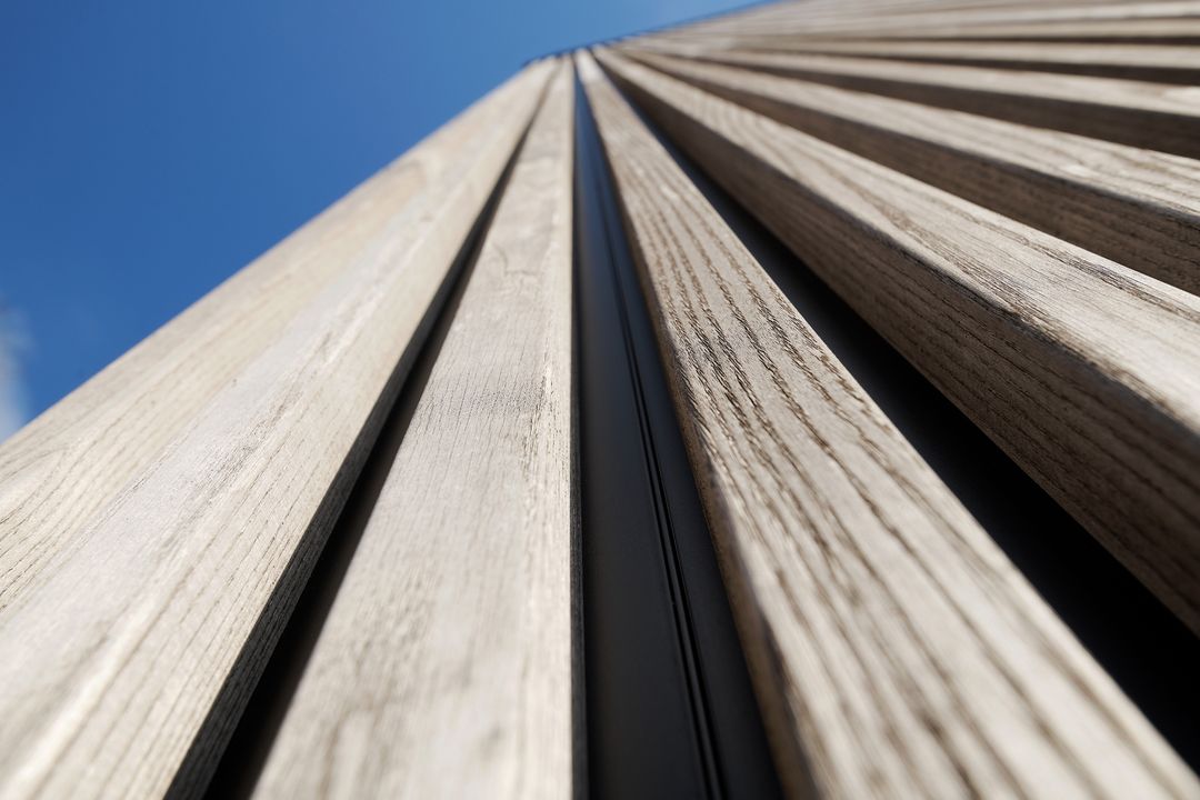 Wood facade cladding - Woodfac is a fire-resistant wooden facade