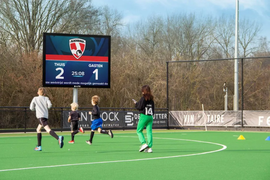 Revolutie door scorebord app